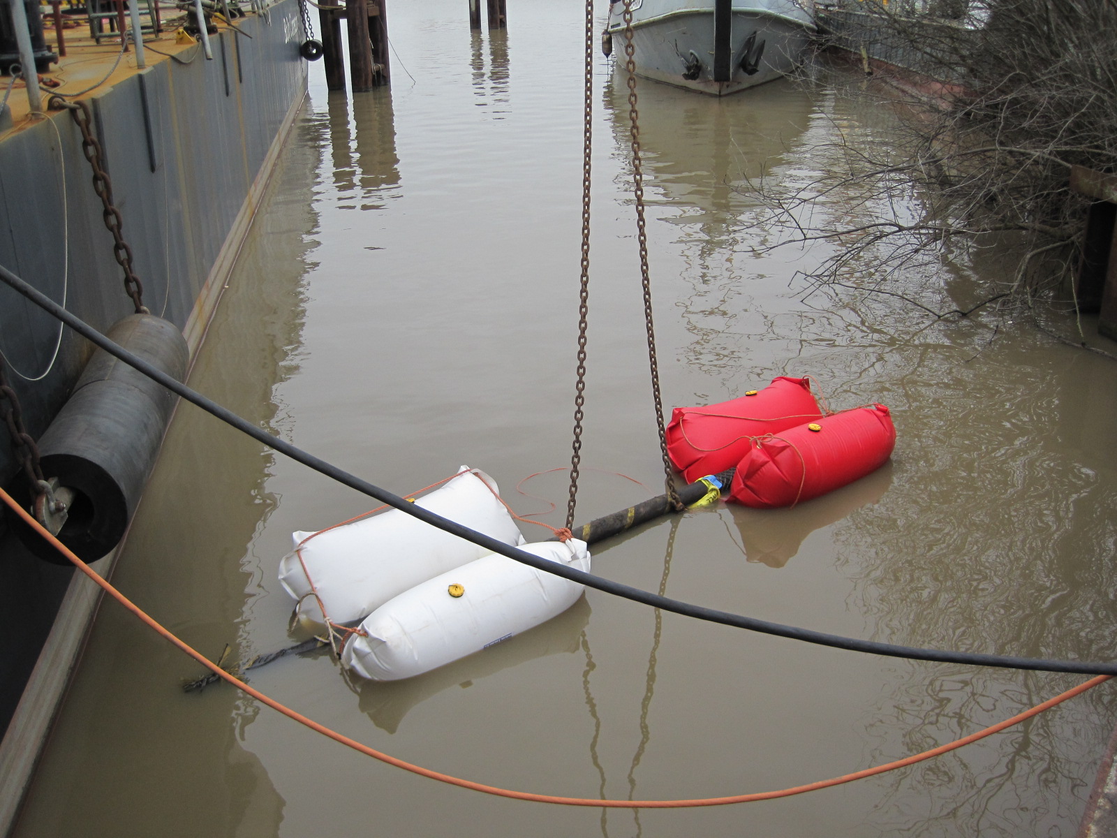 Inflatable cable, pipe, or hose floaters